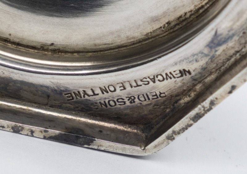 A George V silver sugar caster, of hexagonal form with stepped ...