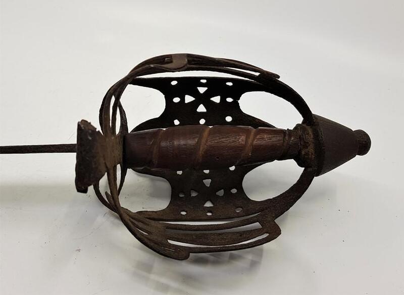 An 18th century Scottish basket hilt sword, having 80.5cm single edged ...