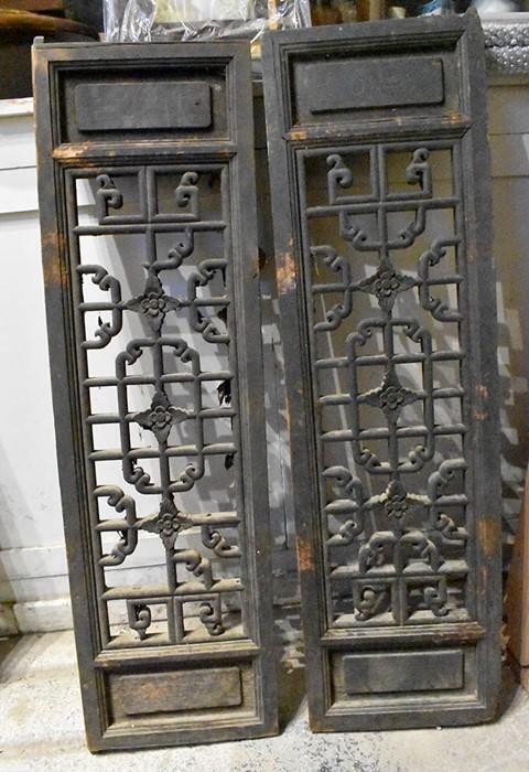 4 carved wooden Chinese window shutters.